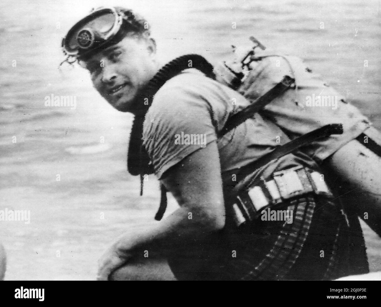 Rocket expert Dr Werner Von Braun prepares to do some spear fishing ...