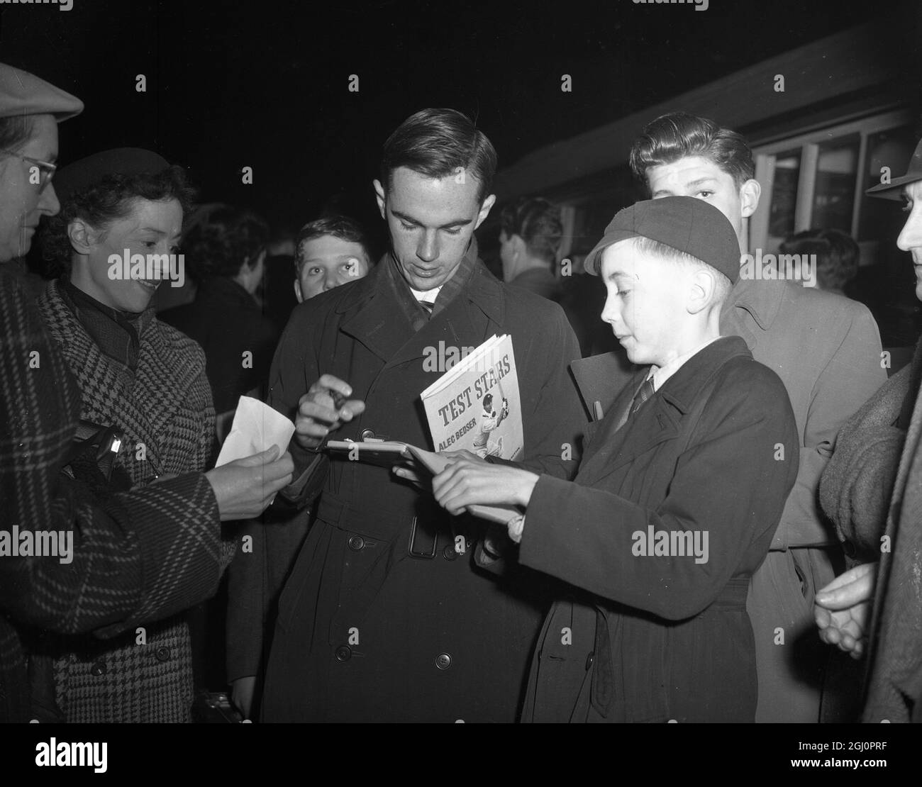 Ian Craig , 17-year-old 'baby' of the Australian touring team, signing ...