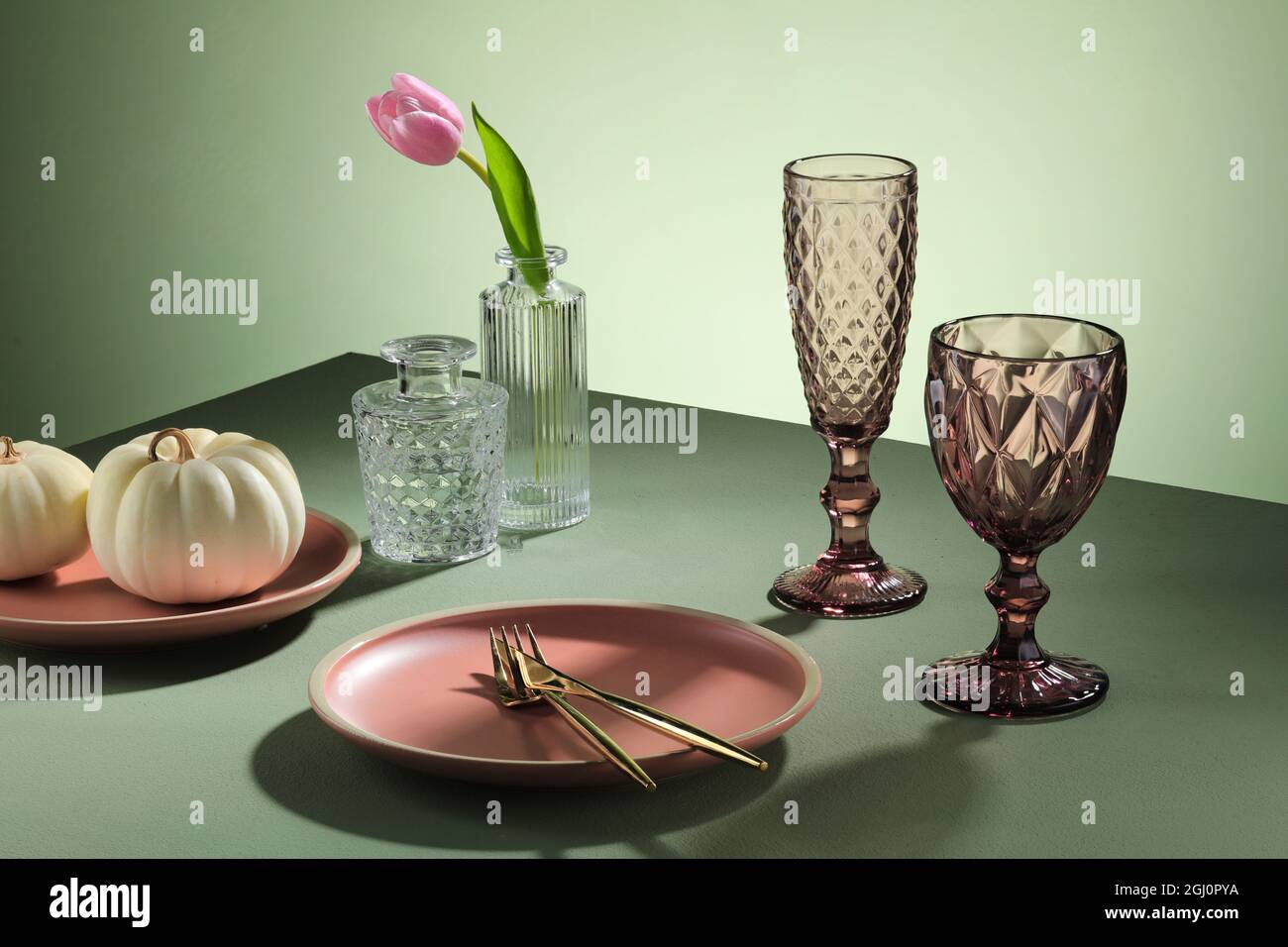 Luxury table setting for dining in pastel colors with flowers, glass ...