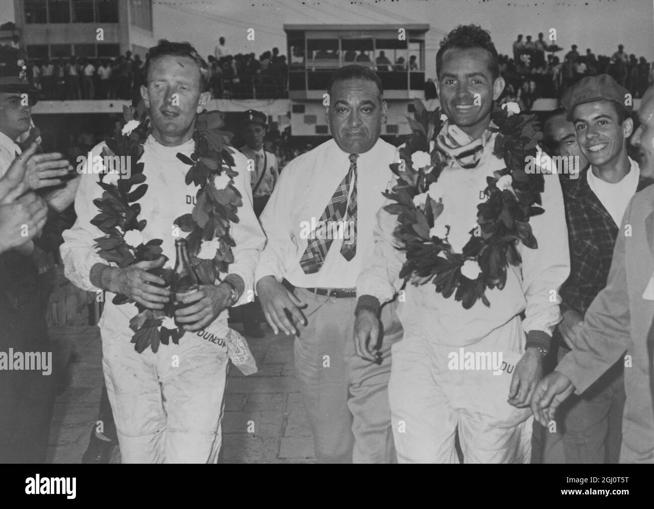 RACE DRIVERS CLIFF AILSON ( LEFT ) AND PHIL HILL AFTER WINNING THE ...