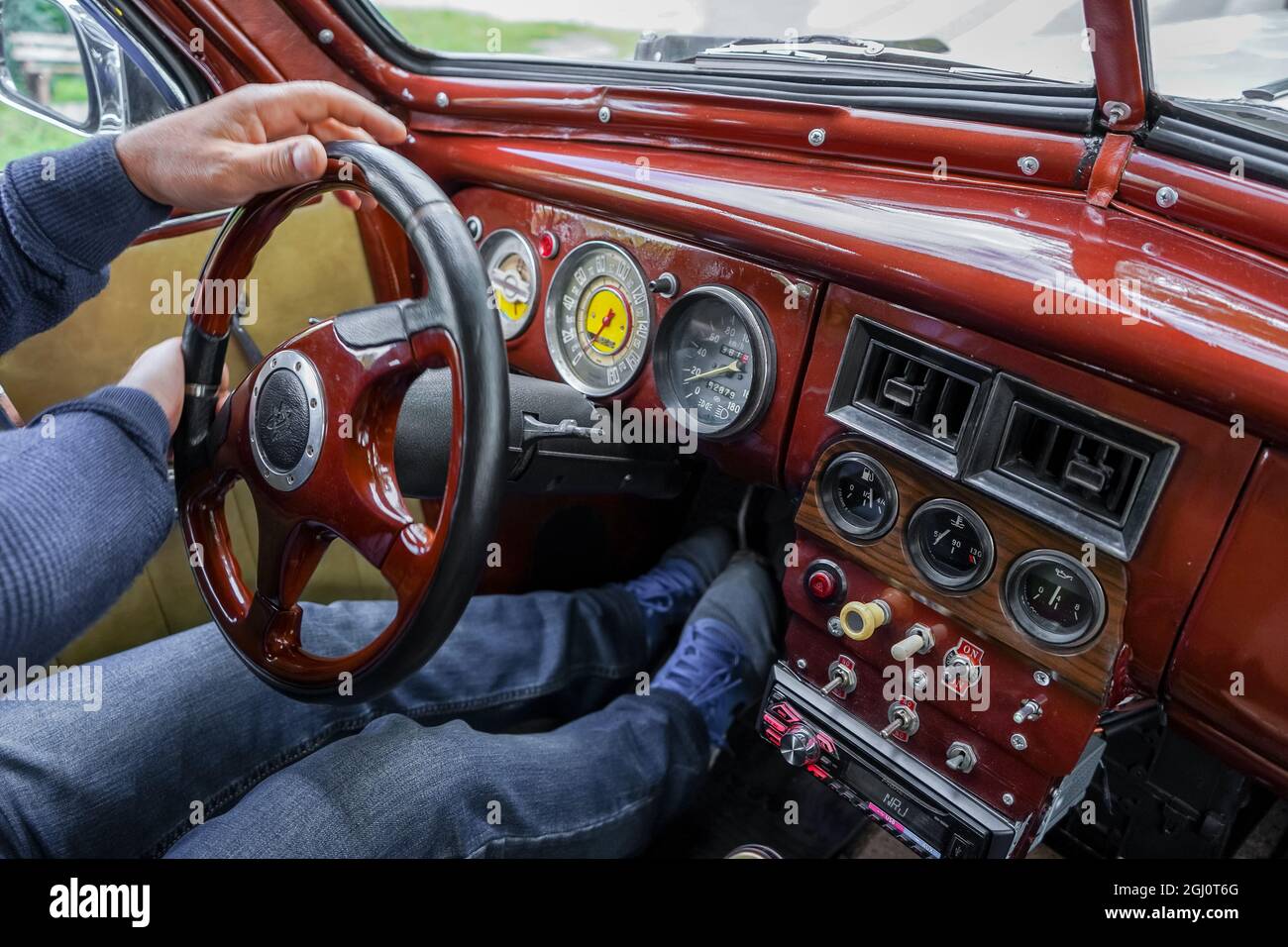 Retro car salon. Instrument panel with buttons, toggle switches and ...