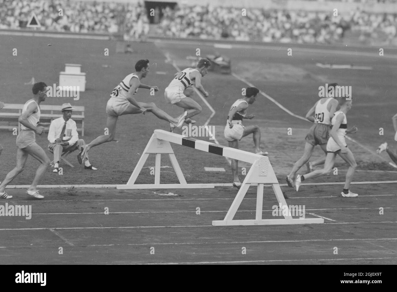 OLYMPIC GAME 3000M STEEPLECHASE SIMON CLEARS OBSTACLE 2 SEPTEMBER 1960 ...