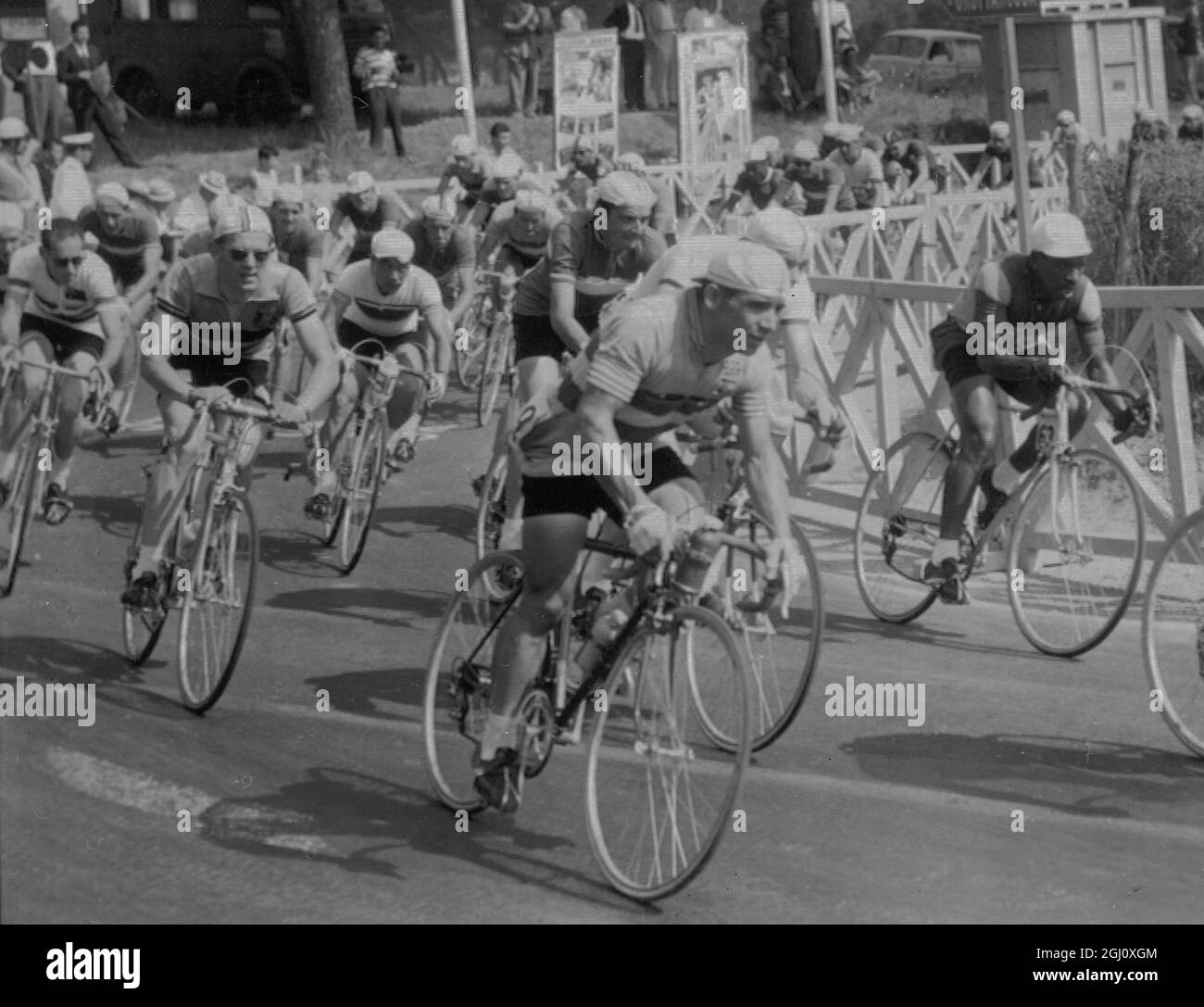 Riders round bend hi-res stock photography and images - Alamy