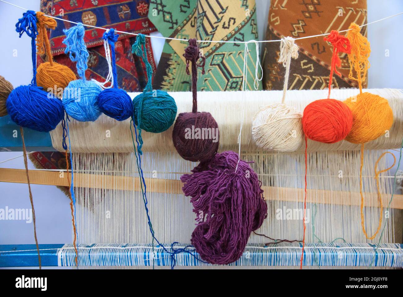 Turkey, Izmir Province, Selcuk, weaving loom, rug making, balls of wool ...