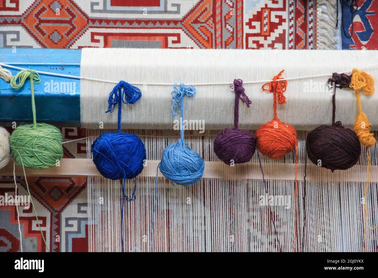 Turkey, Izmir Province, Selcuk, weaving loom, rug making, balls of wool ...