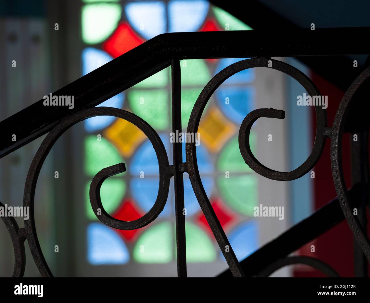 Cuba, Vinales, wrought iron railing and stained glass window Stock ...