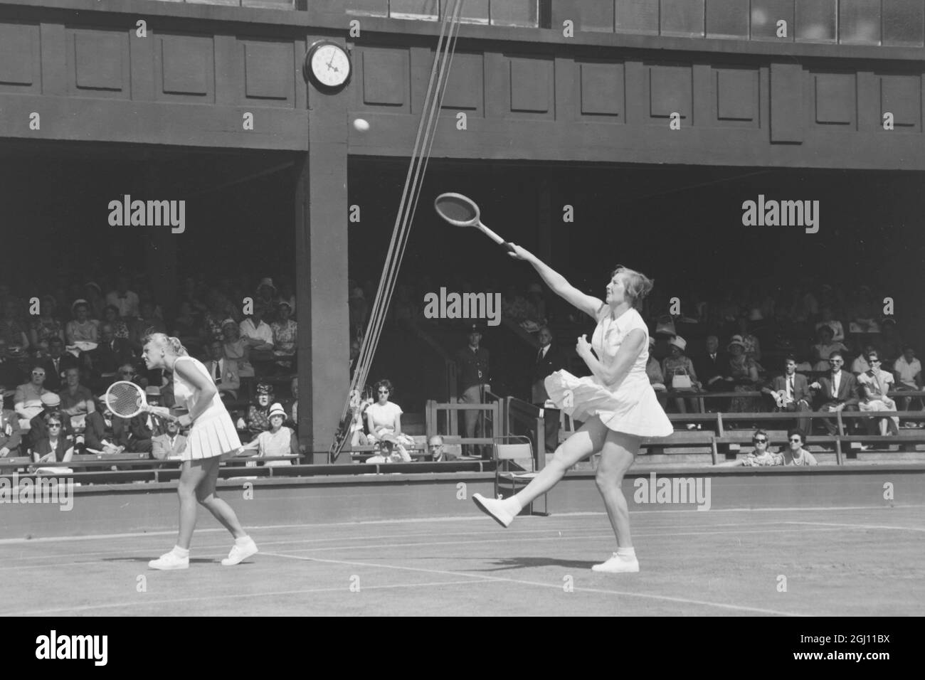 PLAYERS CHRISTINE TRUMAN AND ANN HAYDON JONES IN ACTION DOUBLES AT WIMBLEDON LAWN TENNIS ...