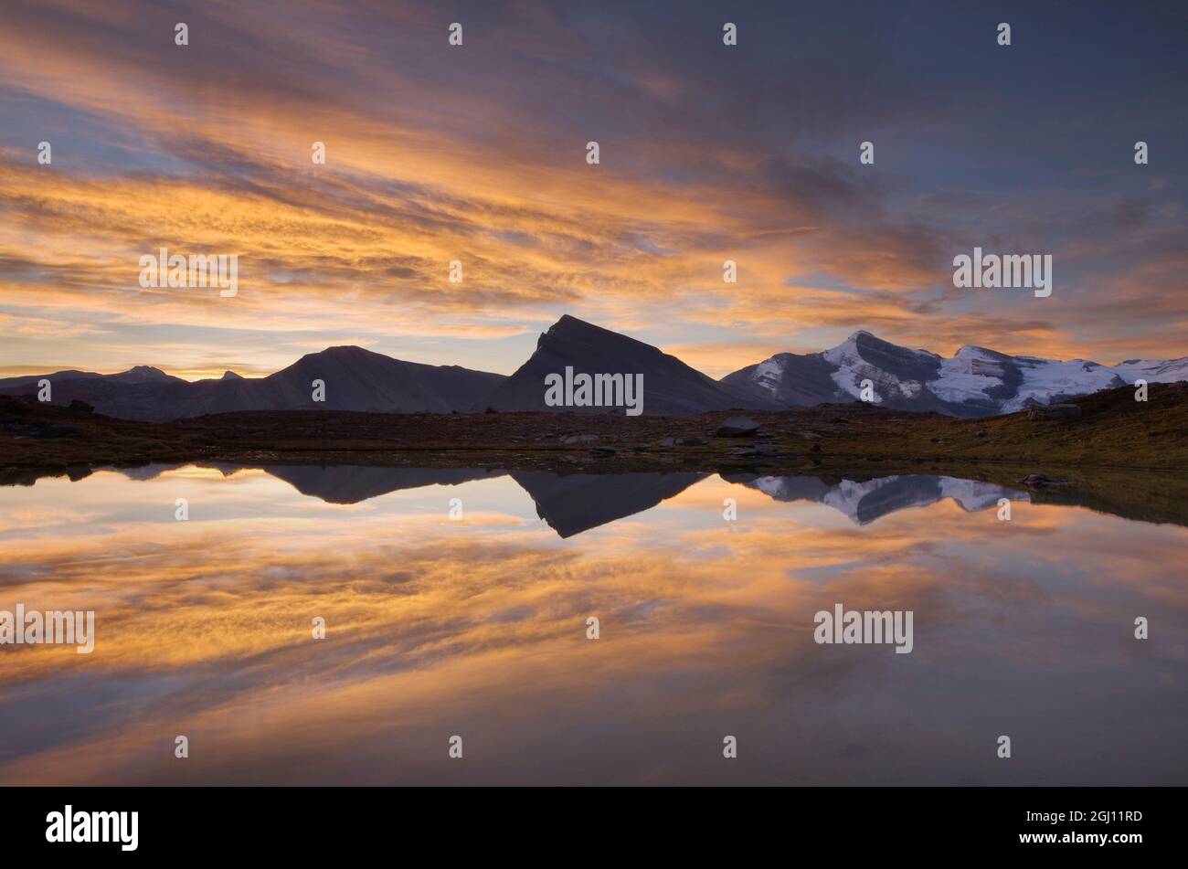 Canada, British Columbia. Sunrise over the Rainbow Range, seen from ...