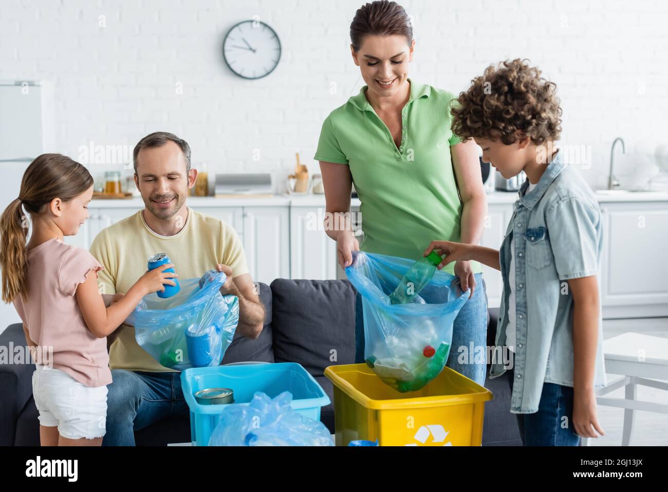 Kids recycle bottles at home hi-res stock photography and images - Alamy