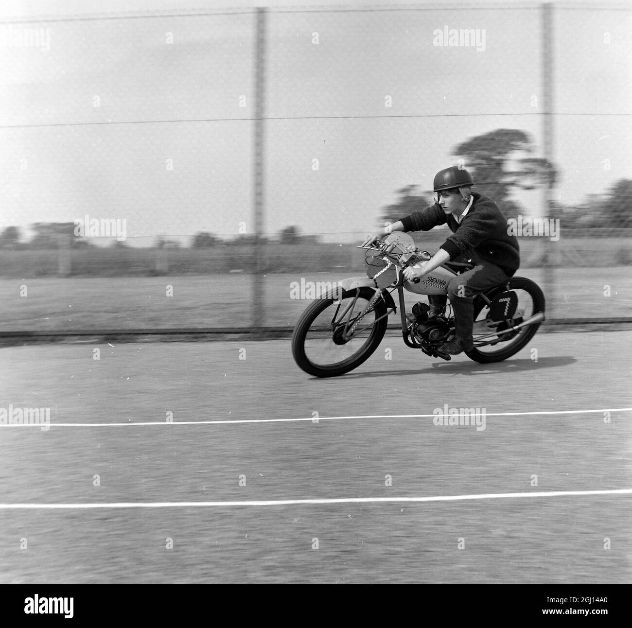 JOE MONKS USING HOME MADE MOTOR CYCLE - ; 1 AUGUST 1962 Stock Photo - Alamy