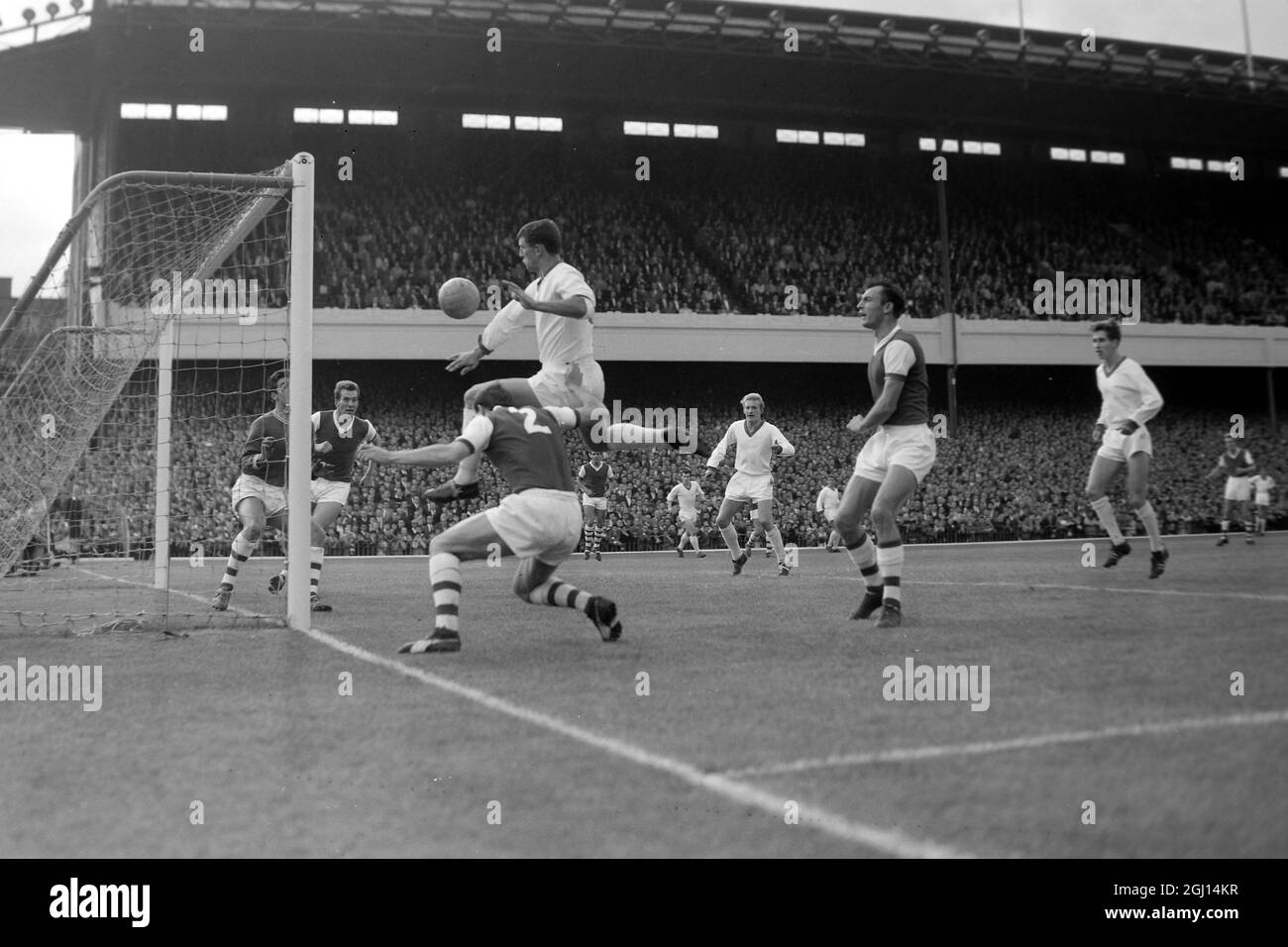 FOOTBALLER DAVID HERD IN ACTION WITH EDWARD MAGILL E - ; 25 AUGUST 1962 ...