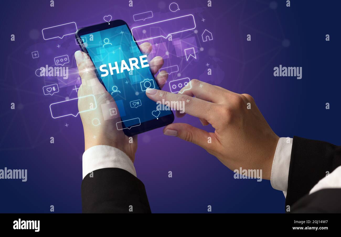 Hand using smartphone with social media concept Stock Photo - Alamy