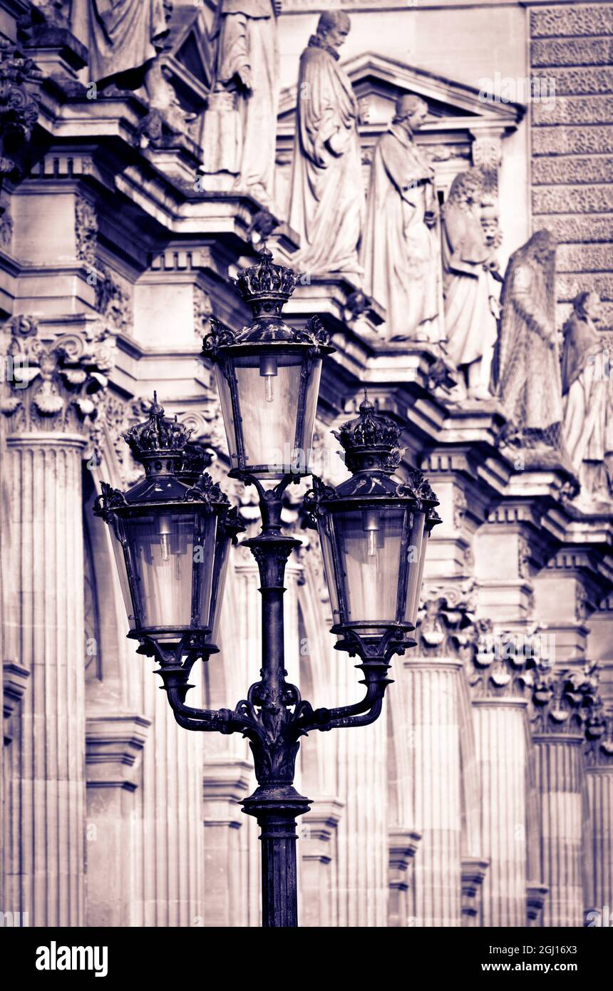 Lamp post and columns at the Louvre Palace, Louvre Museum, Paris ...