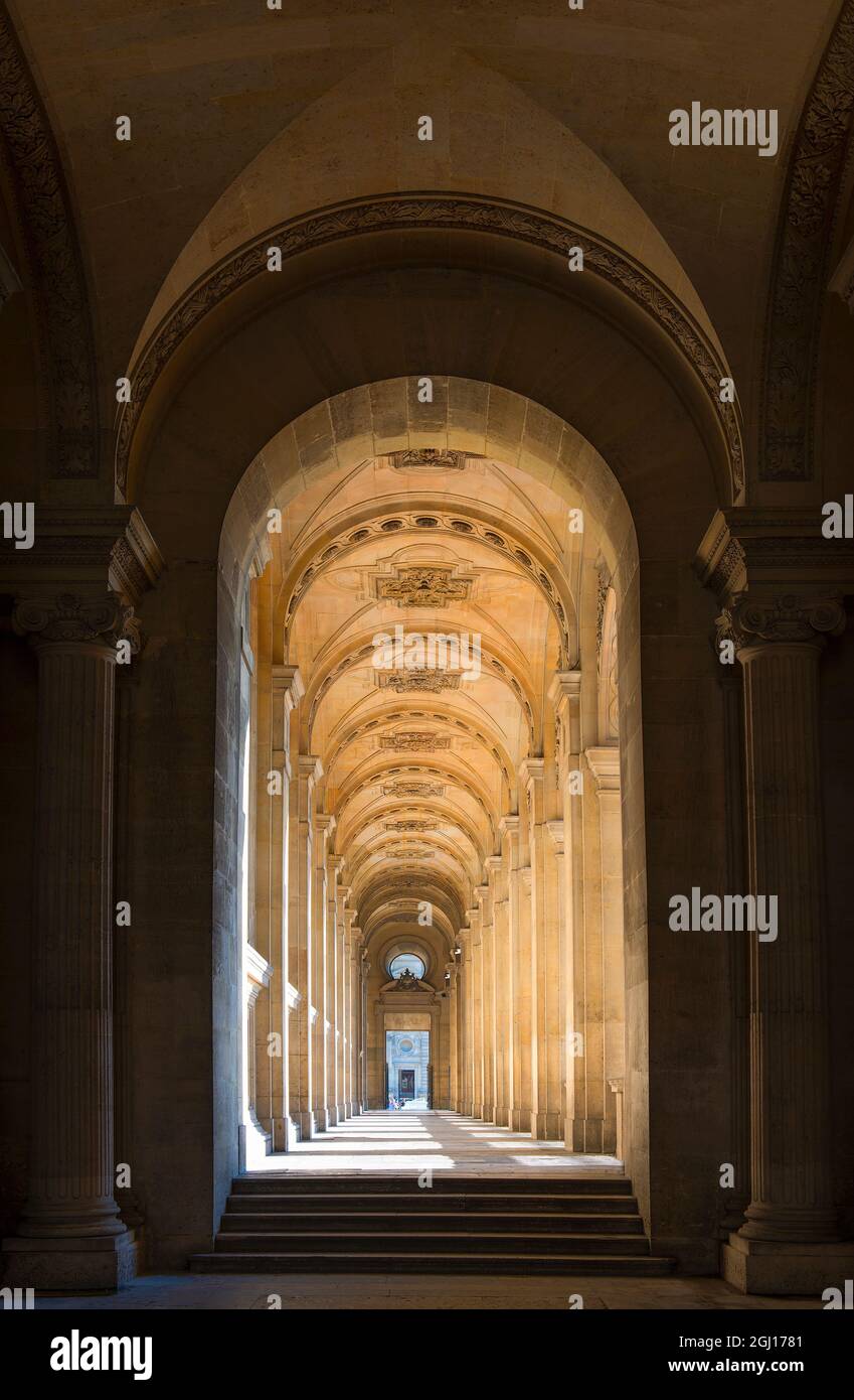 Hallway to the pyramid and courtyard at the Louvre in Paris, France ...