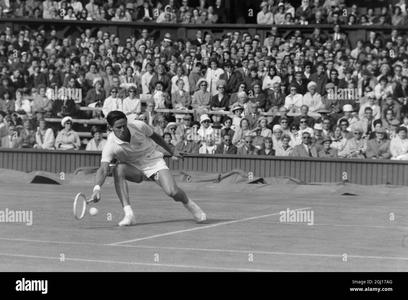 ROY EMERSON IN ACTION AT TOURNAMENT IN WIMBLEDON INTERNATIONAL TENNIS ...
