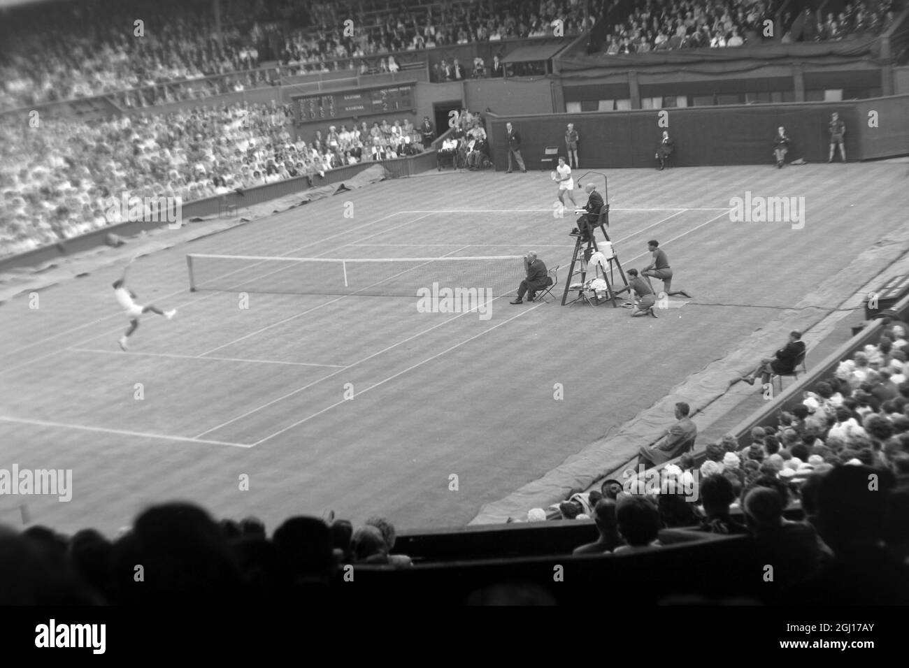 PLAYERS IN ACTION AT TOURNAMENT IN WIMBLEDON INTERNATIONAL TENNIS ...