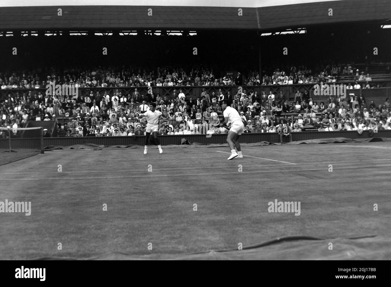 MICHI FUJI AND OSAMU ICMIGURO IN ACTION AT TOURNAMENT IN WIMBLEDON ...