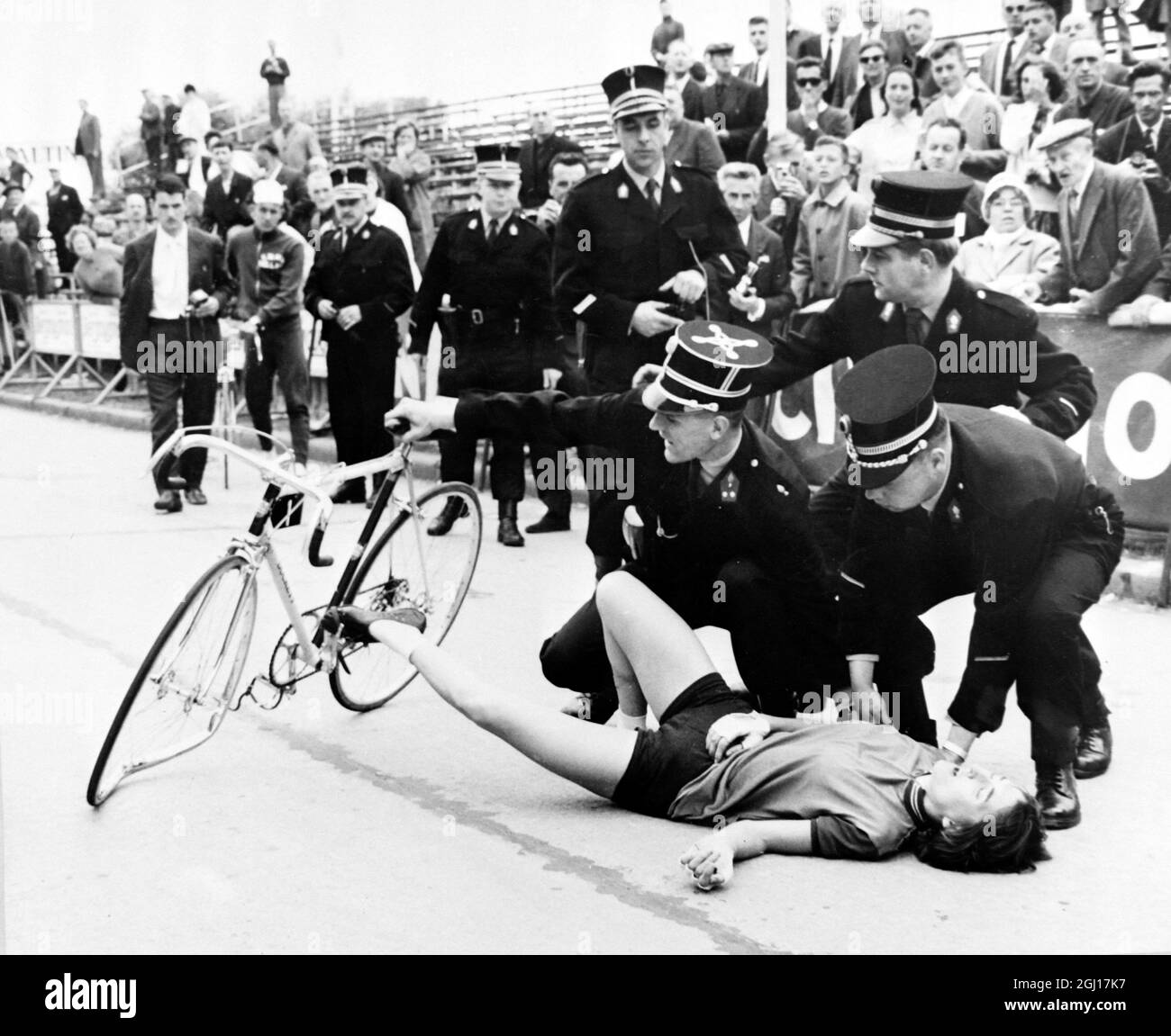 10 AUGUST 1963 BRITISH CYCLIST JO BOWERS FALLS AT THE FINISH OF THE ...