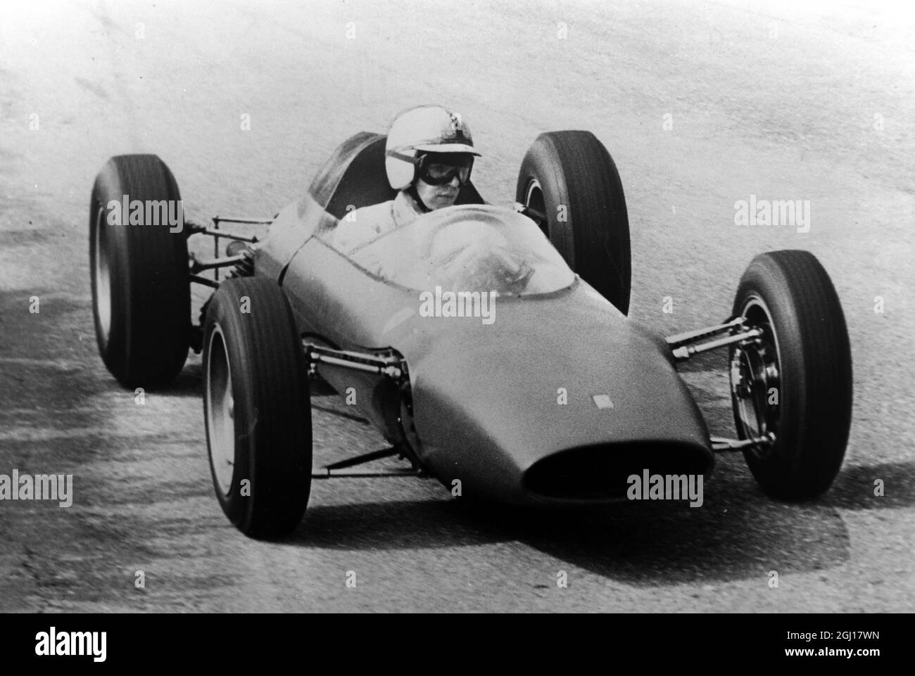 BRITISH RACING DRIVER JOHN SURTEES TRIES OUT NEW FERRARI CAR AT MONZA ...