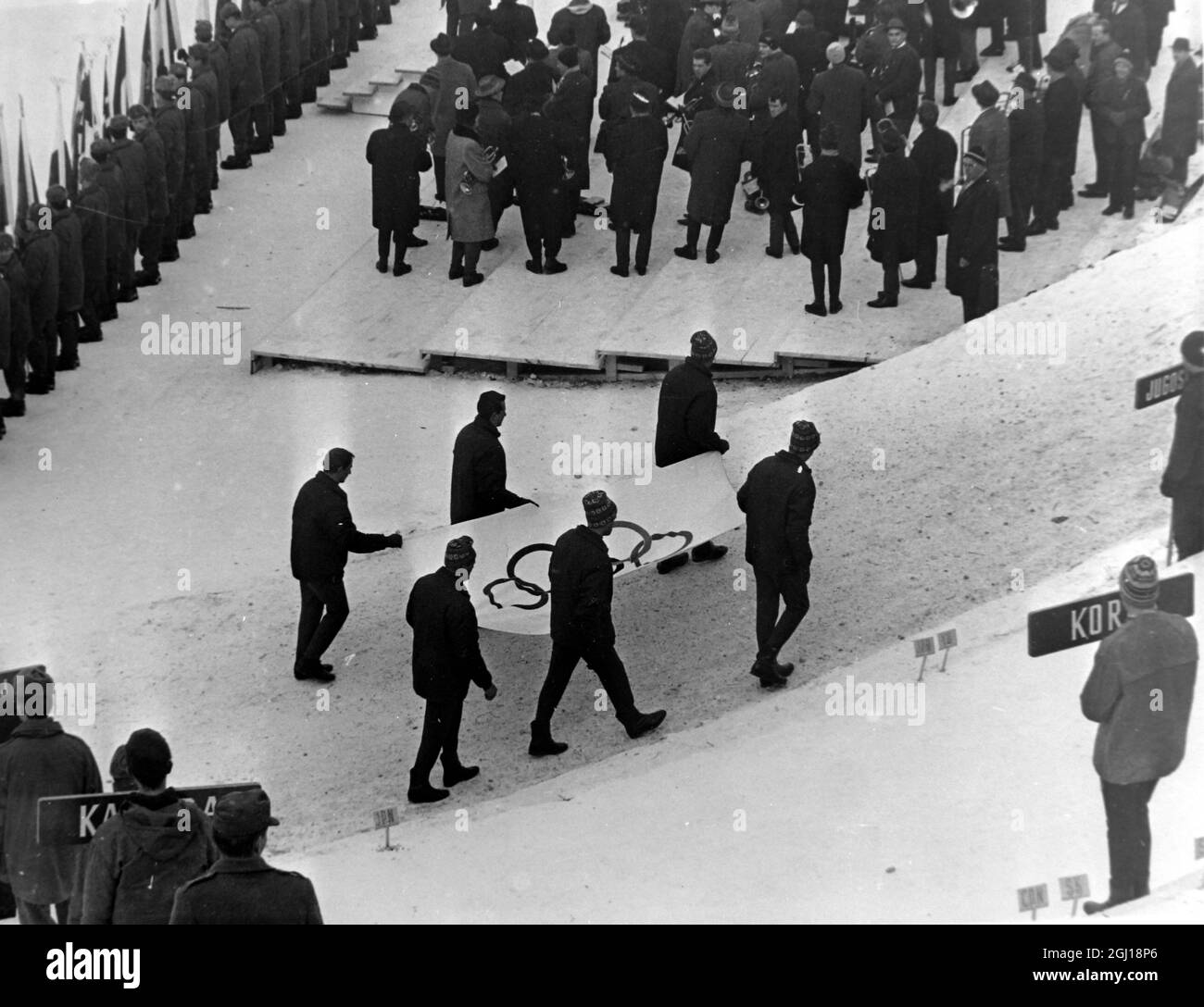 WINTER OLYMPICS IN INNSBRUCK, AUSTRIA - OLYMPIC FLAG CARRIED PAST TEAMS ...
