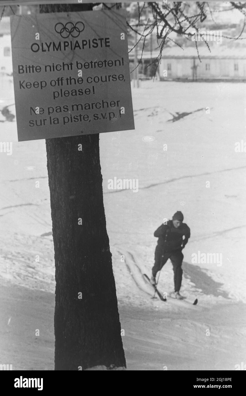 WINTER OLYMPICS IN INNSBRUCK, AUSTRIA - SIGNS WARNING COMPETITORS KEEP ...