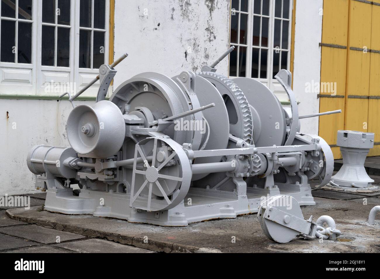iron industrial winch wheel detail close up Stock Photo - Alamy