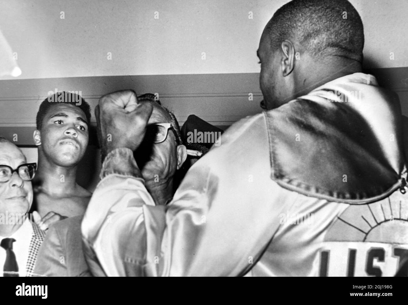 SONNY LISTON WAVES FIST AT AMERICAN BOXING CHAMPION CASSIUS CLAY ...