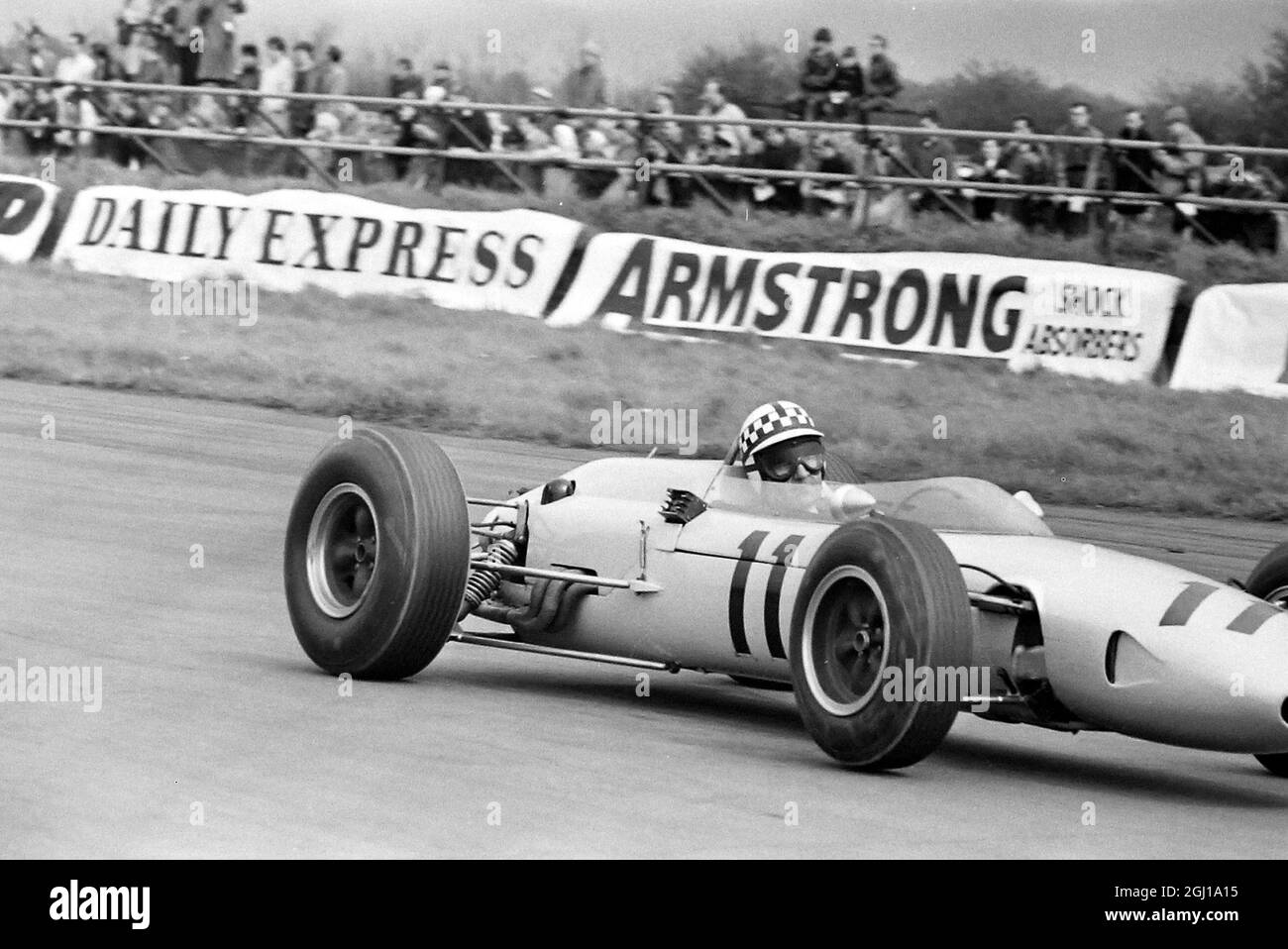 INNES IRELAND - RACING DRIVER IN ACTION DURING 16TH INTERNATIONAL ...