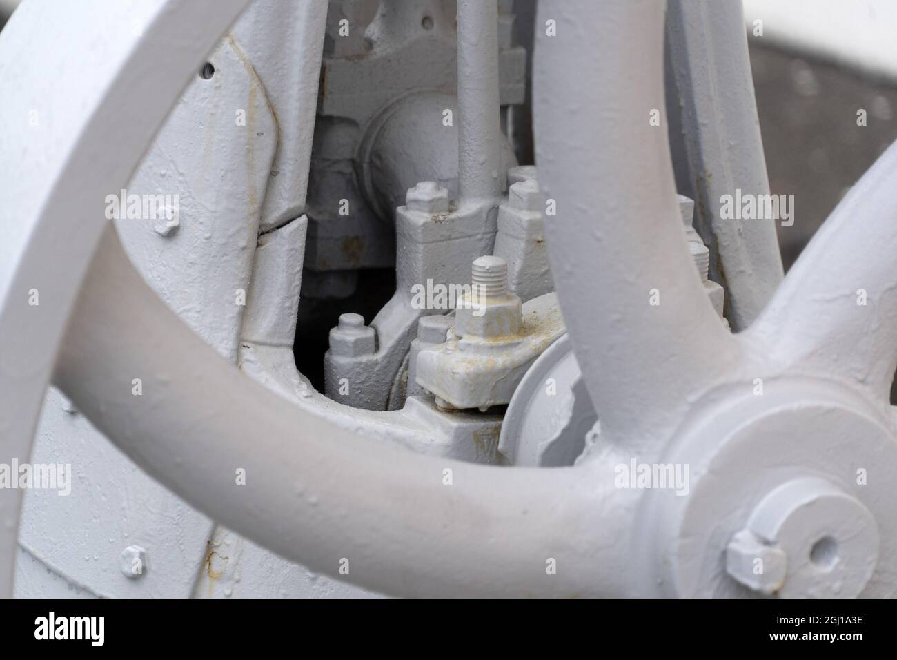 iron industrial winch wheel detail close up Stock Photo - Alamy