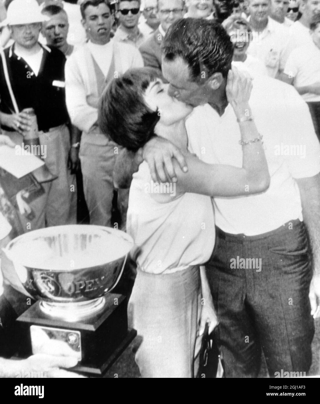 GOLF PLAYER TONY LEMA WITH TROHPY WIFE KISSES THE WINNER IN MICHIGAN ...