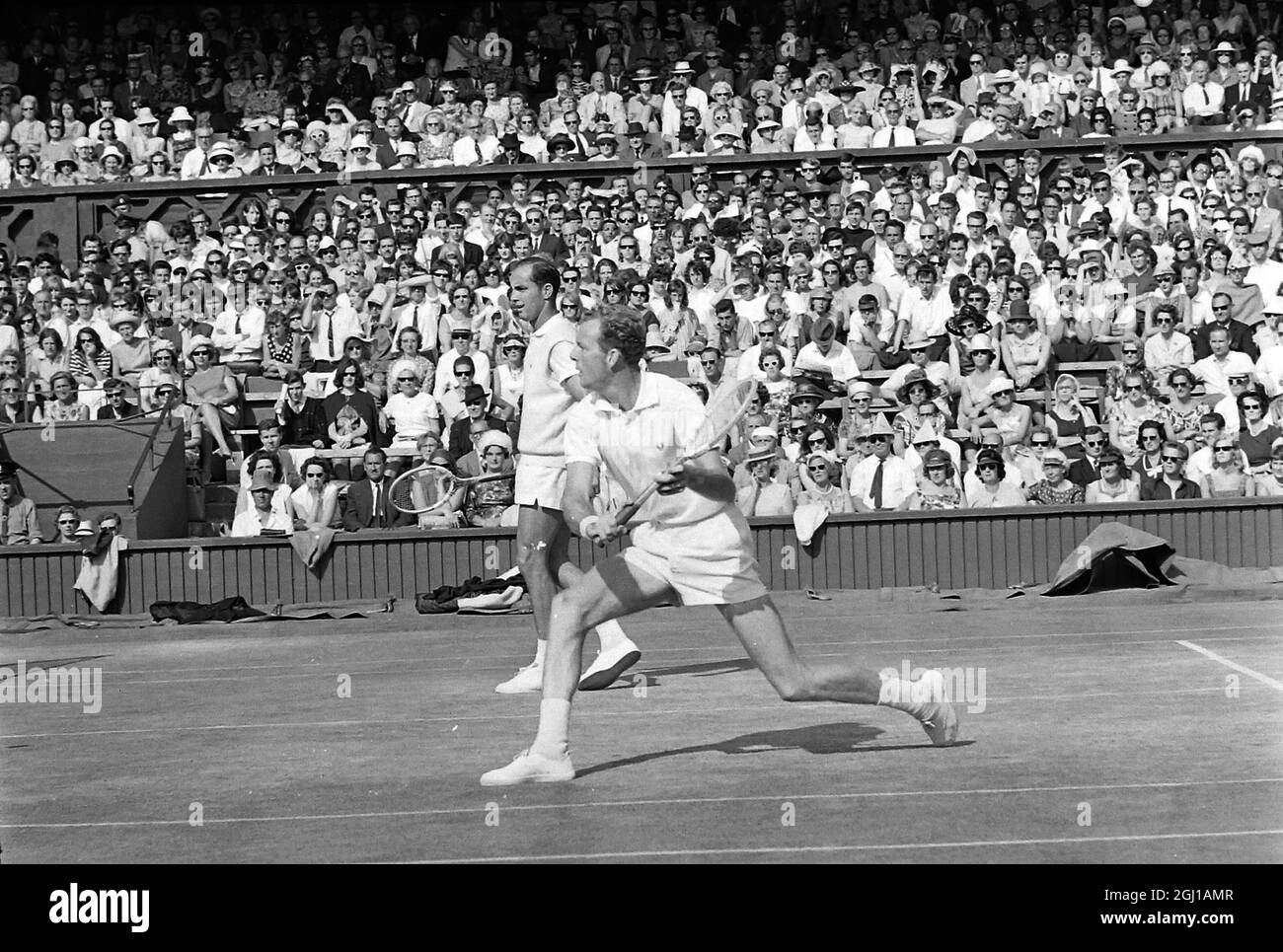 BOB HEWITT AND FRED STOLLE MENS DOUBLES IN ACTION IN THE ALL ENGLAND ...