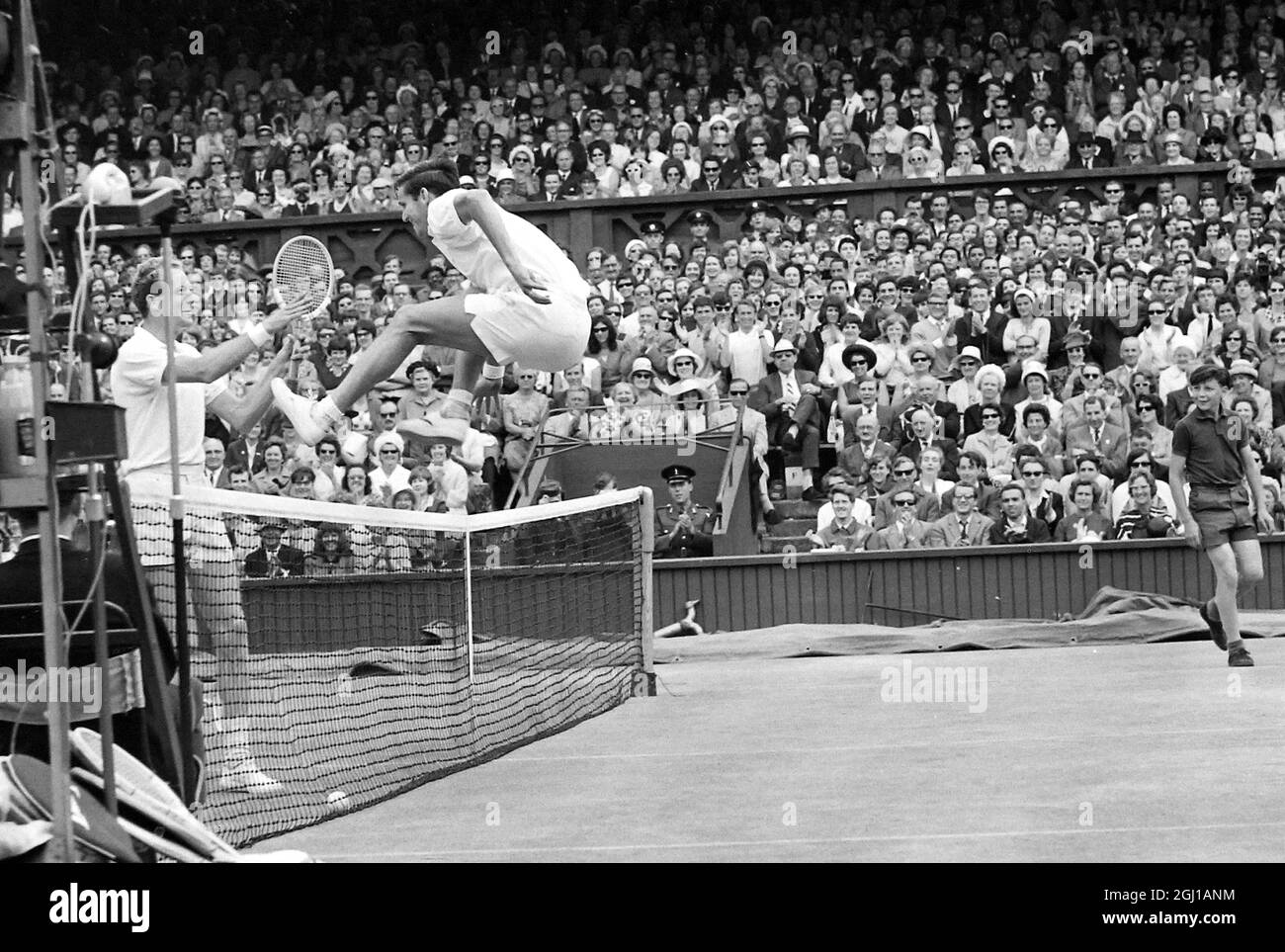 ROY EMERSON WINS MENS SINGLES V FRED STOLLE IN ACTION IN THE ALL ...