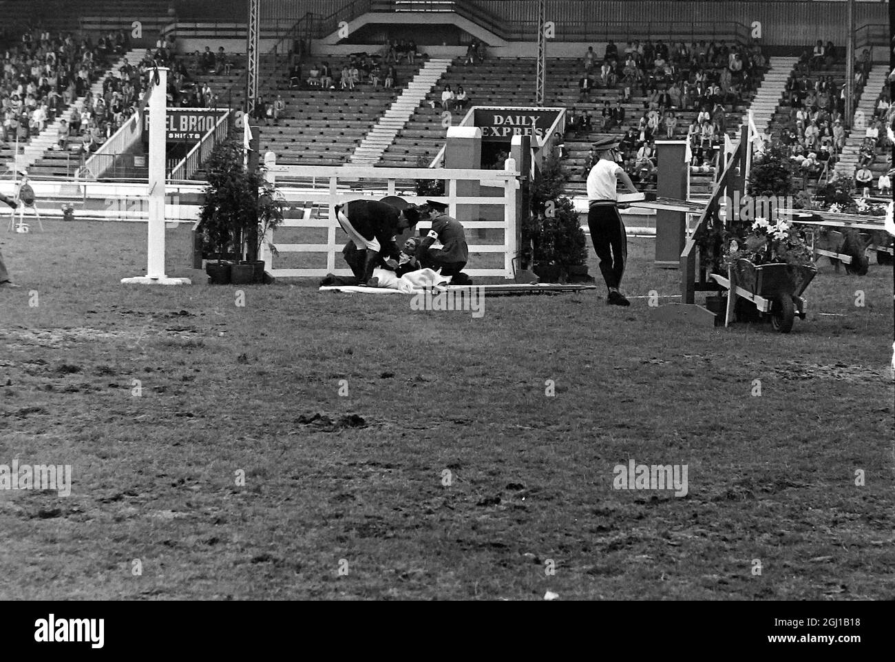 HORSE SHOWS CONNOLLY-CAREW D RECEIVES 1ST AID AFTER FALL ; 23 JULY 1964 ...