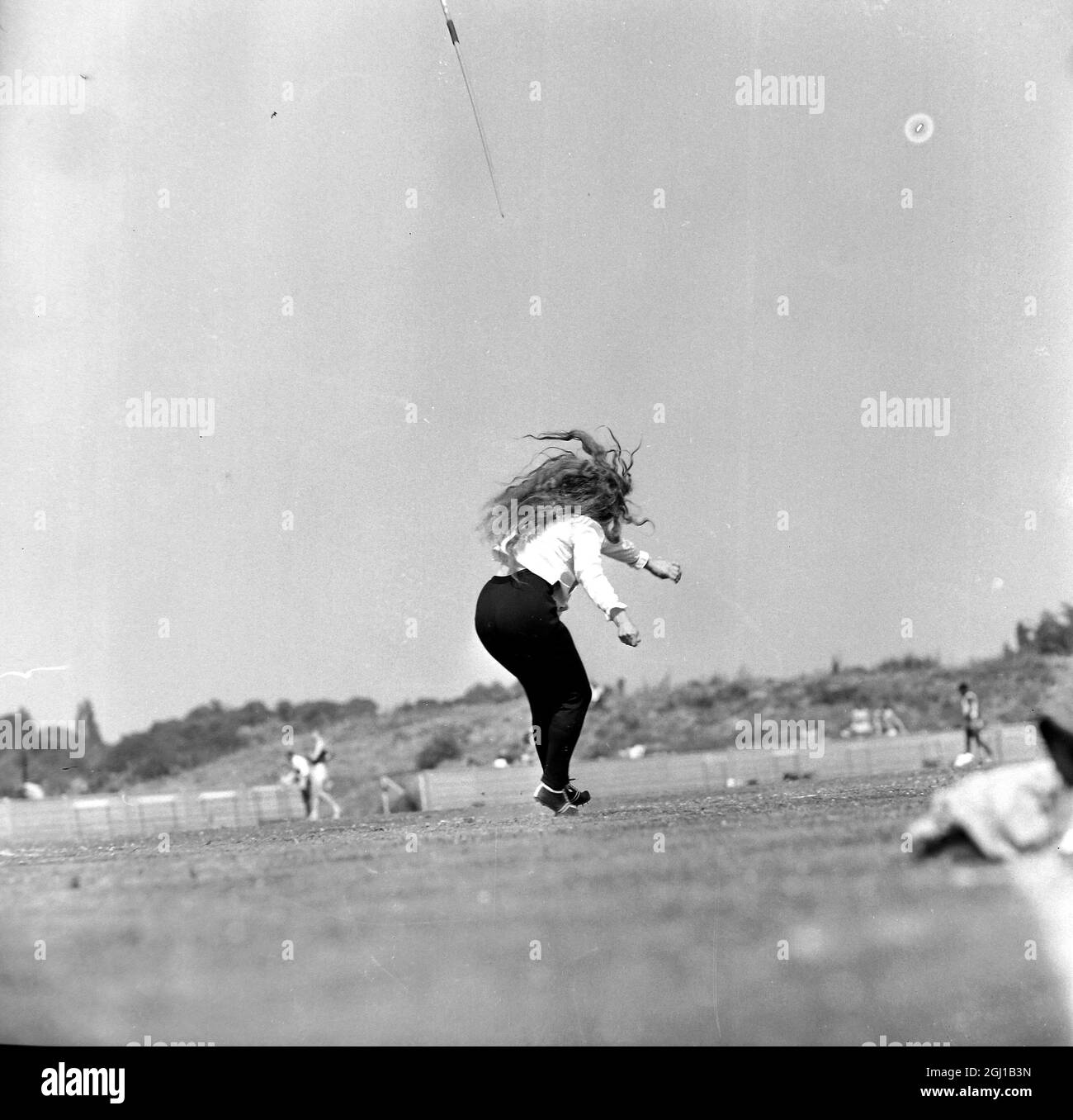 ATHLETE LESLIE ARMSTRONG IN JAVELIN ACTION IN LONDON ; 25 JULY 1964 ...