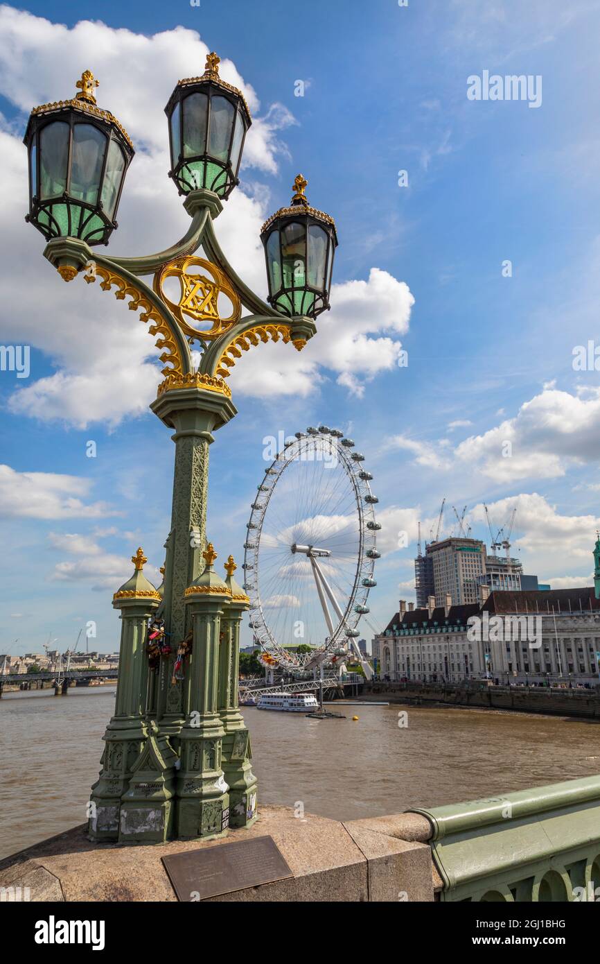 The London Eye and iconic British lamppost in London, England Stock ...