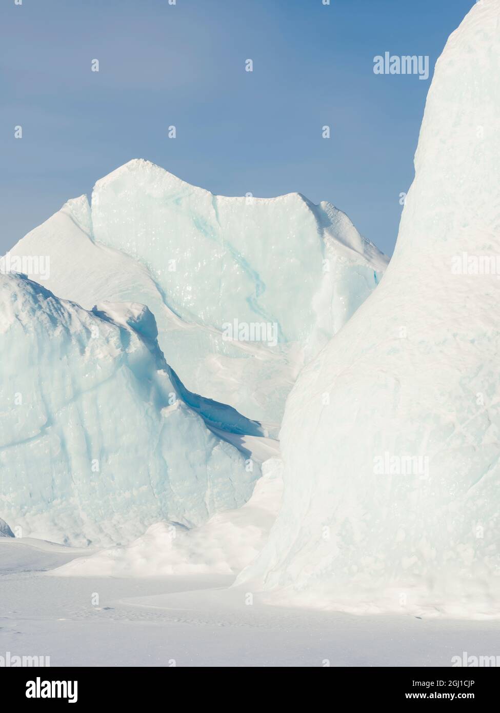 Icebergs frozen into the sea ice of the Uummannaq Fjord System during ...