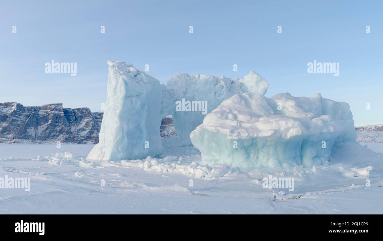 Icebergs frozen into the sea ice of the Uummannaq Fjord System near ...