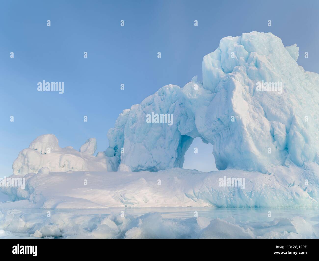 Icebergs frozen into the sea ice of the Uummannaq Fjord System near ...