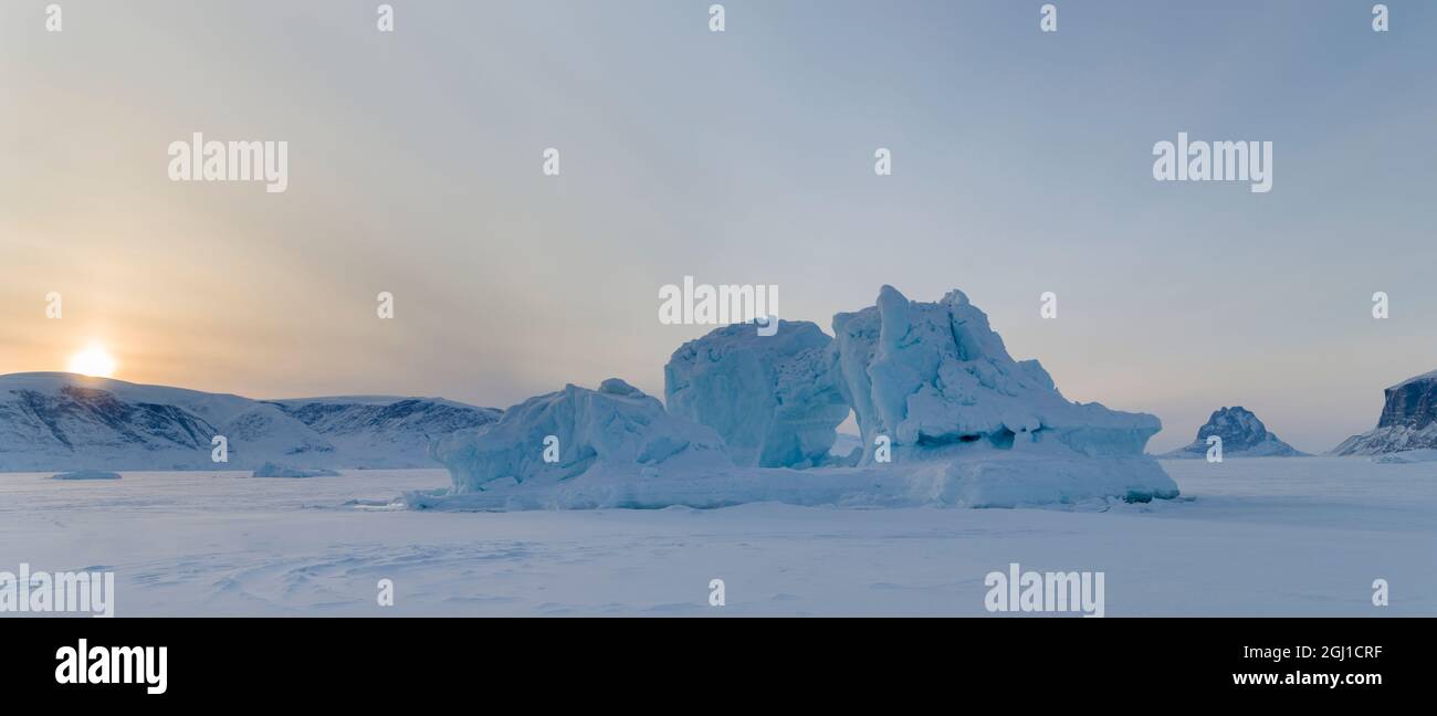 Icebergs frozen into the sea ice of the Uummannaq Fjord System near ...
