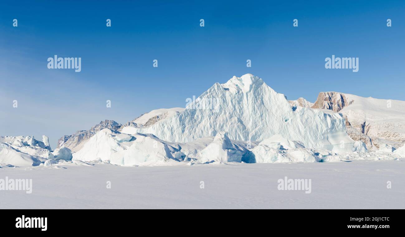 Icebergs frozen into the sea ice of the Uummannaq Fjord System near ...