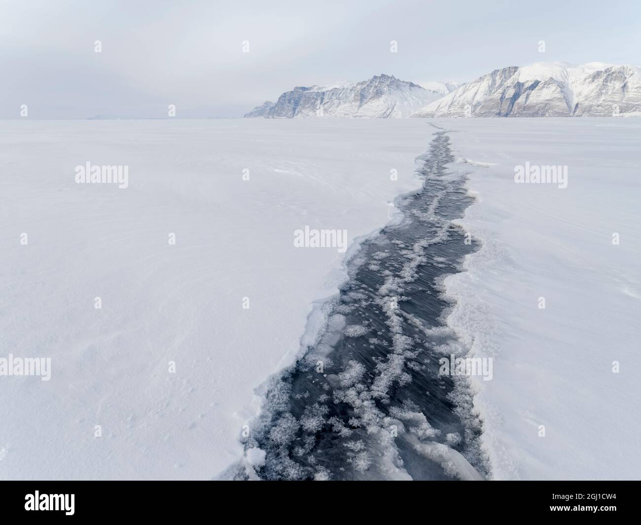 Crack in the sea ice of the Uummannaq Fjord System near Saatut and ...