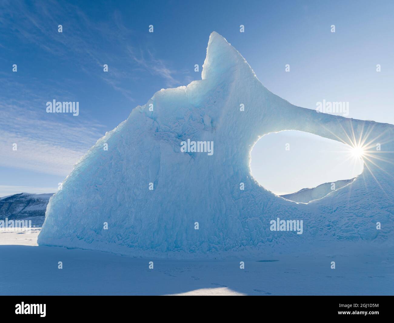 Iceberg frozen into the sea ice of the Uummannaq fjord system during ...