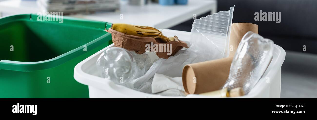Plastic trash in can at home, banner Stock Photo - Alamy