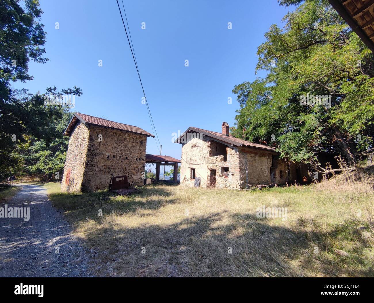old abandoned roof collapsed farm house in pedmont northen italy Stock ...