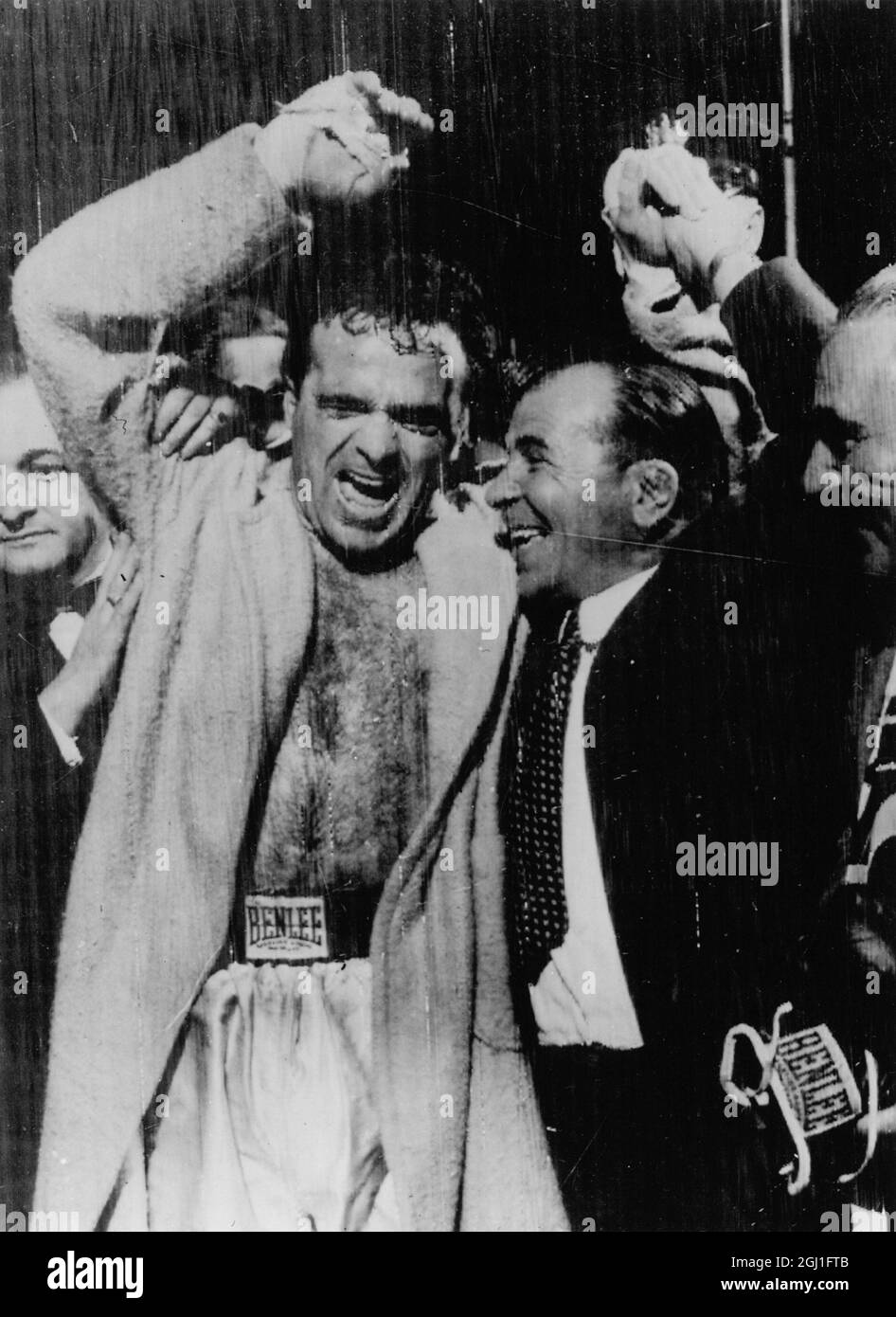 Marcel Cerdan of France being congratulated by his brother Vincent ...
