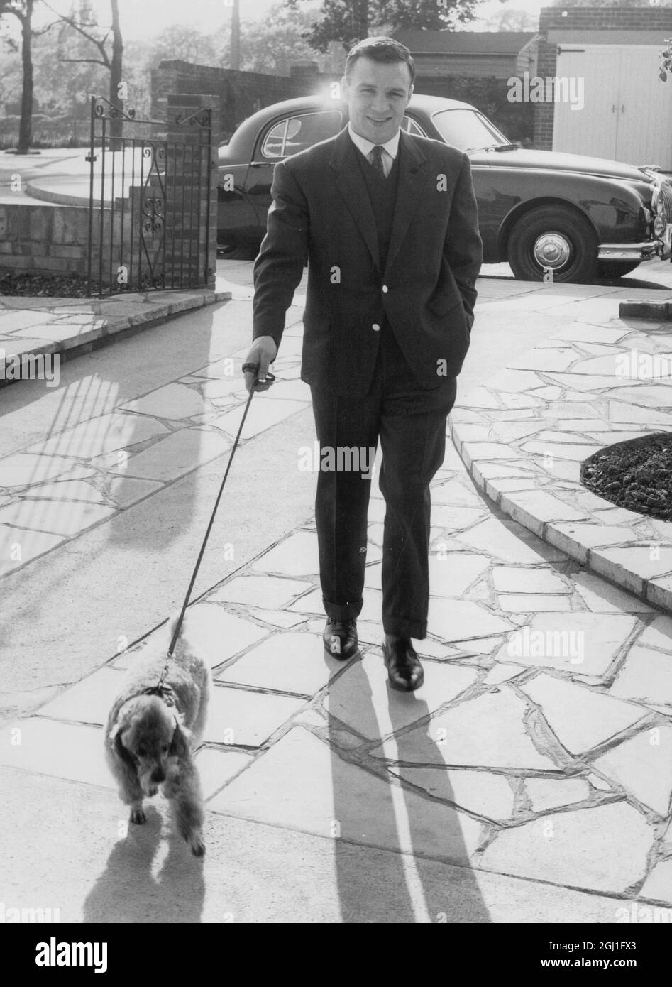 British lightweight Champion Dave Charnley strolls out for a walk with ...