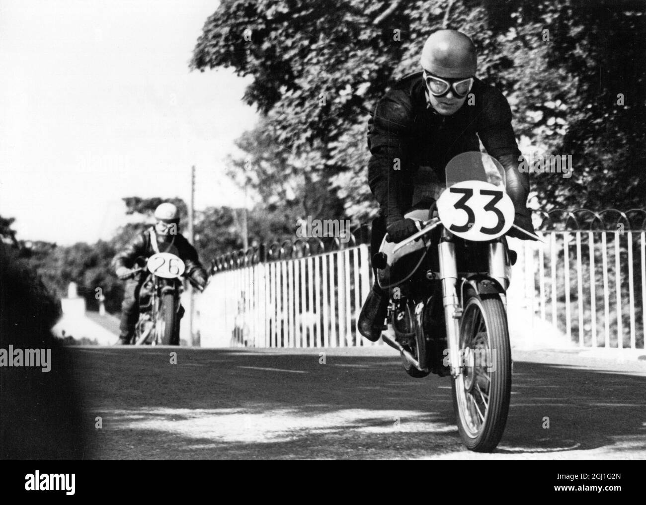Rod Coleman makes a one wheel landing at Ballaugh Bridge during the ...