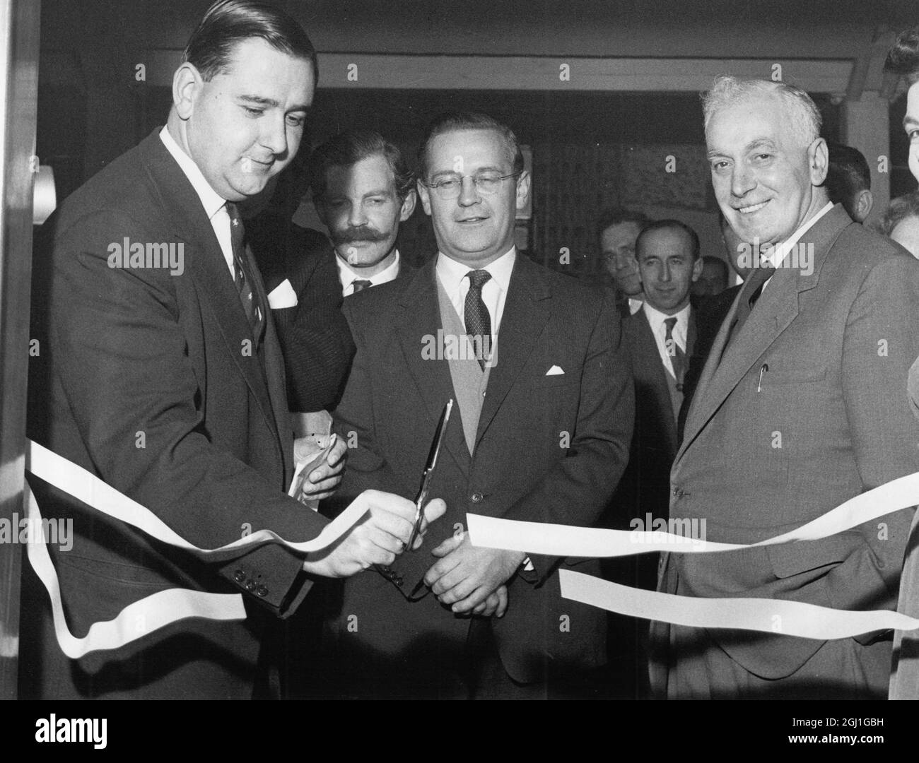 Colin Cowdrey cuts the tape at the ceremony held to open the new ...