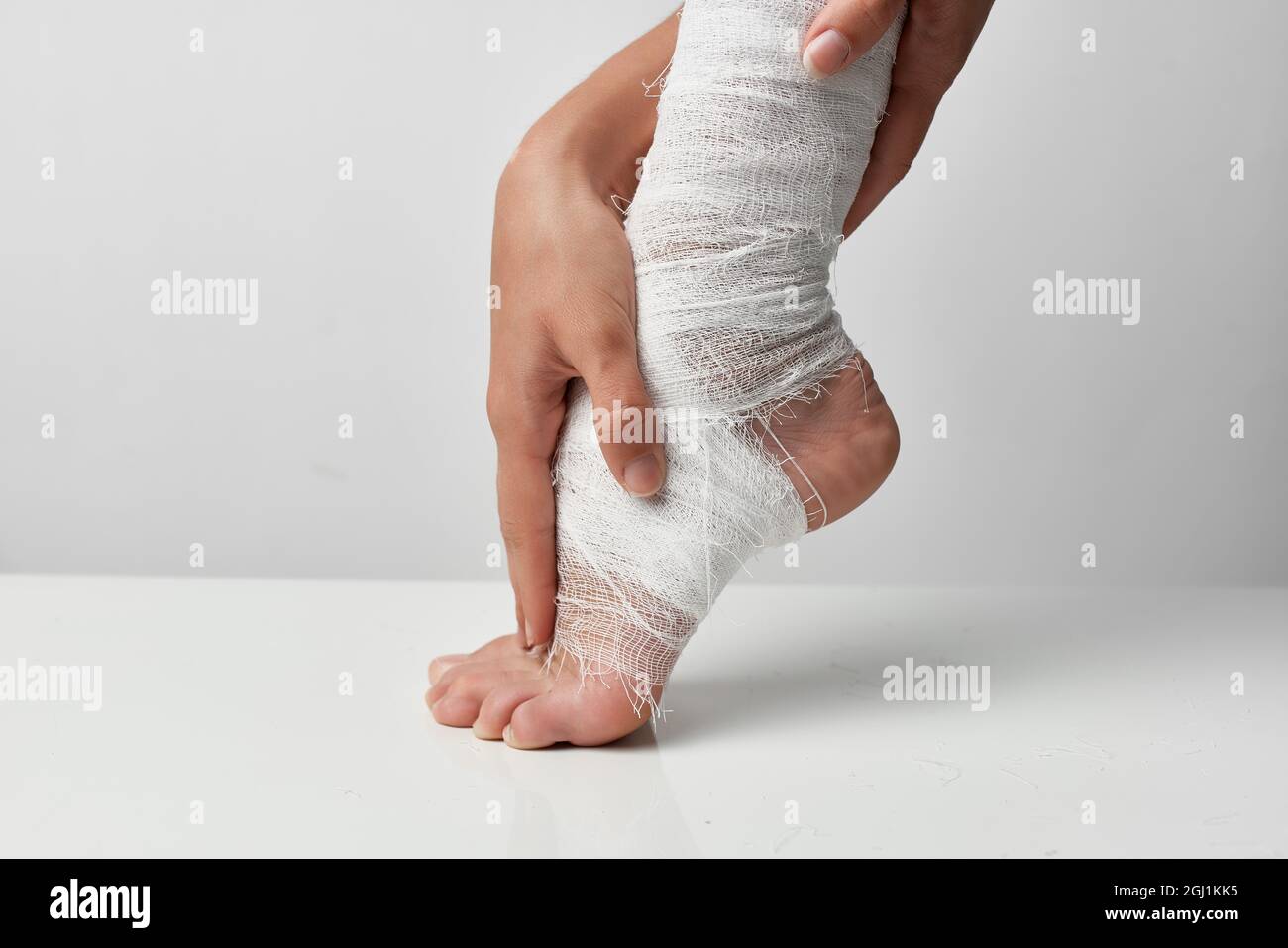 injured leg bandaged close-up lifestyle medicine Stock Photo - Alamy