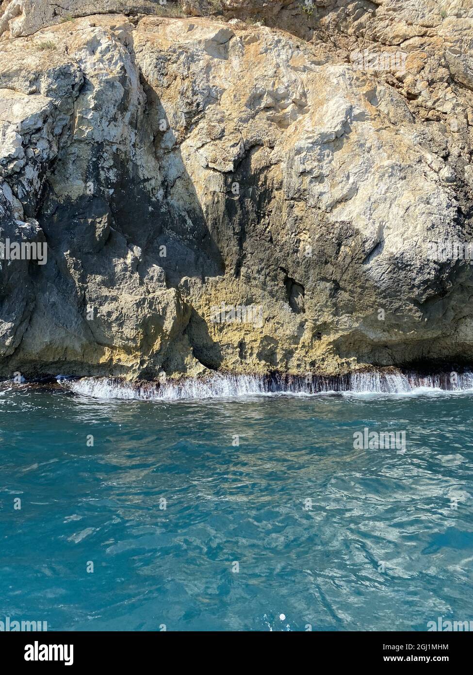 Rocks and mountains surrounding the city of El Jebha in Morocco Stock ...